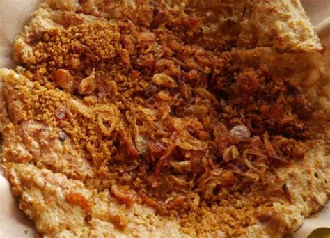 Penjual Kerak Telor Pelestari Tradisi Betawi Literasi Keluarga