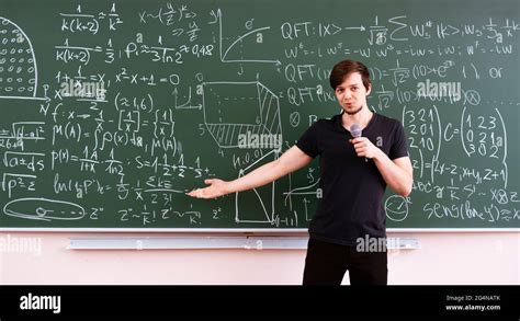 Teacher Of Young Professor Explains The Law Of Physics For Students On