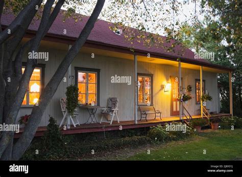 Old Circa 1859 Canadiana Cottage Style Home Facade With Wood Plank