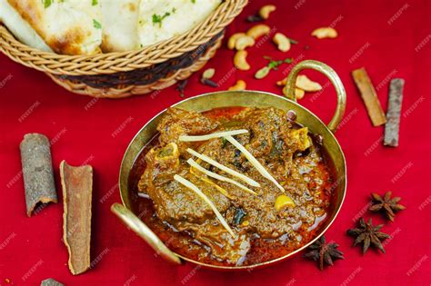 Premium Photo Mutton Bhuna Korma Rogan Goshat With Bread Served In