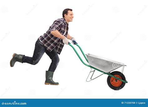 Man Pushing Wheelbarrow And Running Stock Photo Image Of Running