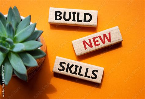 Build New Skills Symbol Concept Word Build New Skills On Wooden Blocks