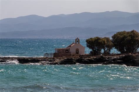 Premium Photo Chapel On The Rocky Coast Of The Island Of Crete In
