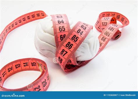 Anatomical Shape Of Human Brain Wrapped Measuring Tape Concept Photo