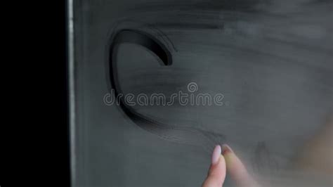 Woman Drawing Heart Shape On Steamed Mirror In Hotel Room Stock Footage