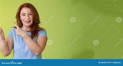 Curious Enthusiastic Gorgeous Redhead Female Intrigued Pointing Upper Left Corner Asking