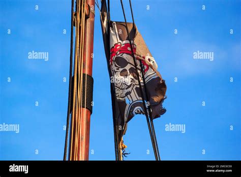 The Pirate Flag Or The Jolly Roger Old Shabby Black Flag With A Skull