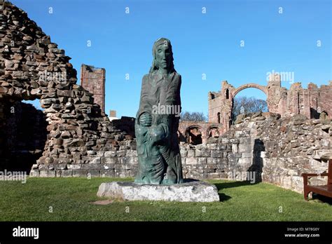 The Statue Of Saint Cuthbert By Fenwick Lawson Placed At Lindisfarne
