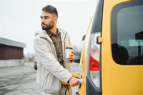 Man Holding Power Connector For Electric Car Stock Image Image Of Green Connection 262186097