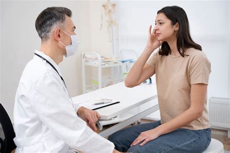 Free Photo Doctor Performing Routine Medical Checkup
