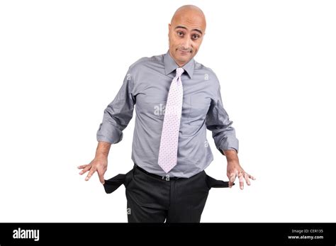Man Showing Empty Pockets Isolated In White Stock Photo Alamy
