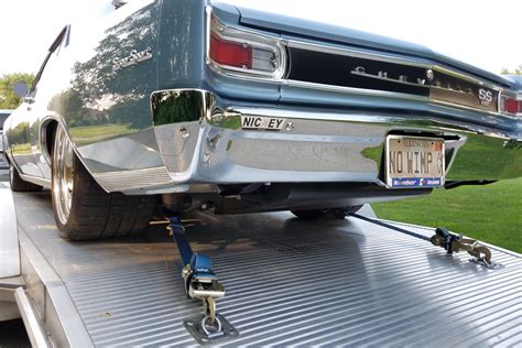 Ratchet Strap A Car To Your Trailer So It Stays Where It Should