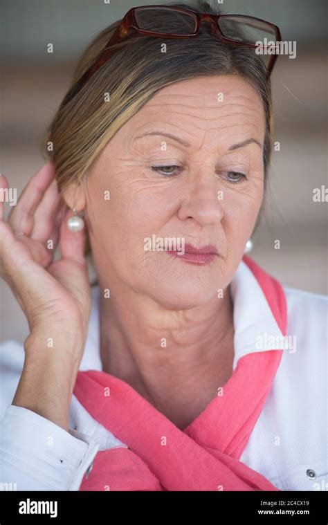 Potrait Smart Attractive Mature Business Woman With Glasses And Serious