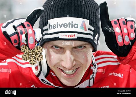 Swiss Ski Jumper Simon Ammann Pictured With His Bronze Medal After