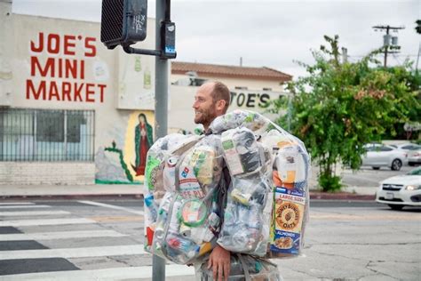 Environmental Activist Wears A Custom Suit Showing All The Trash He