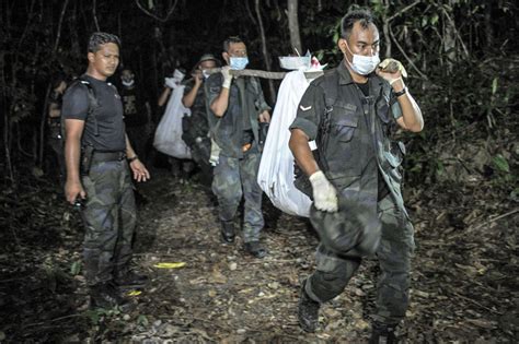 Malaysia Removes Bodies From Jungle On Eve Of People Smuggling Talks