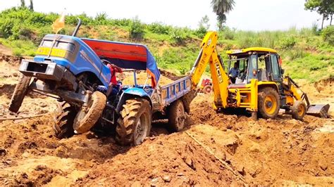 New Jcb Dx Backhoe Machine Loading Mud In Sonalika Di RX Tractor Jcp Machine Jcb Tractor