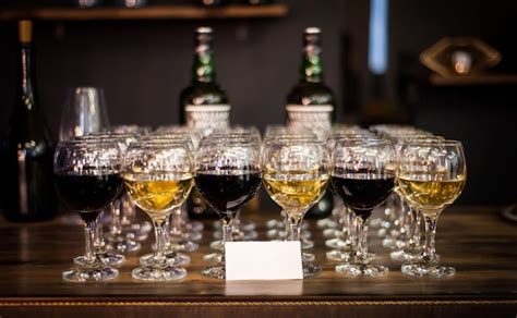 Premium Photo Glasses Of Wine On The Bar With A Neutral Business Cardxa