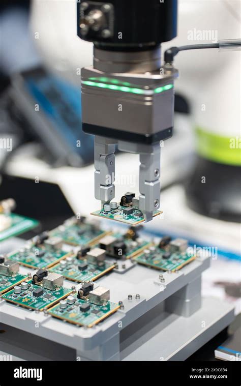 Microchip And Microprocessor Assembly With Automated Robotic Arm Factory Equipment Electronics