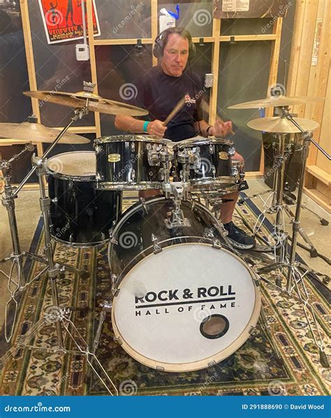 Man Playintg The Drums In The Rock And Roll Hall Of Fame Editorial