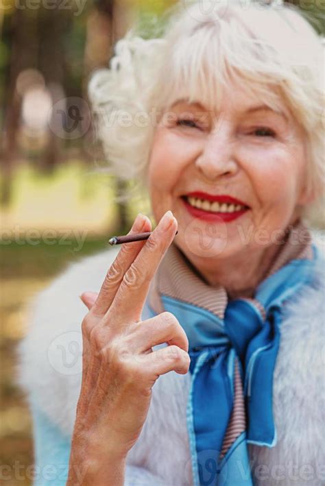 Smiling Senior Elegant Stylish Fashionable Woman With Grey Hair In Fur