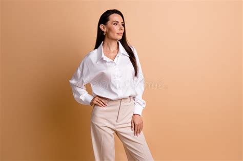 Photo Of Serious Lovely Classy Banker Girl Put Hand Waist Look Empty
