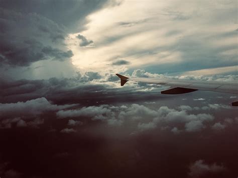 Premium Photo Low Angle View Of Airplane Flying In Sky