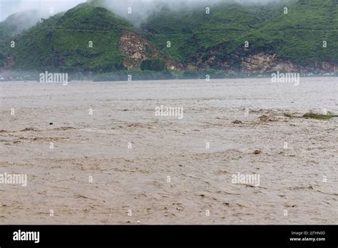 Due To Heavy Monsoon Rains In Summer The River Swat Has Turned Into A