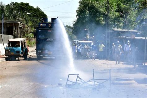 Photos Migrant Workers Clash With Police In Gujarat News Photos