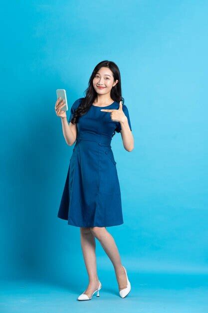 Premium Photo Portrait Of Beautiful Woman In Blue Dress Isolated On