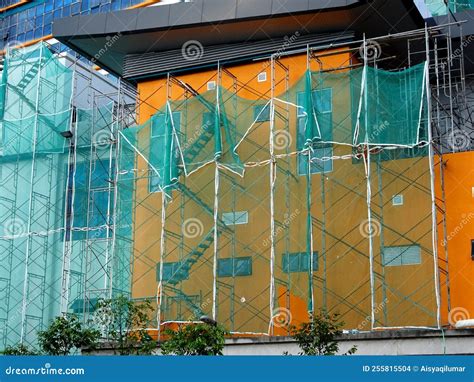 Metal Scaffolding Is Used As A Temporary Structure That Supports Works At The Construction Site