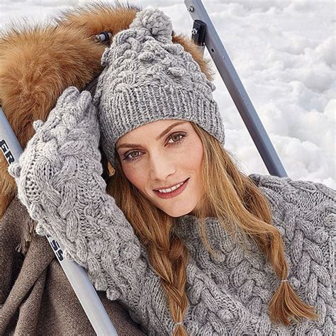 Шапка с косами и шишечками