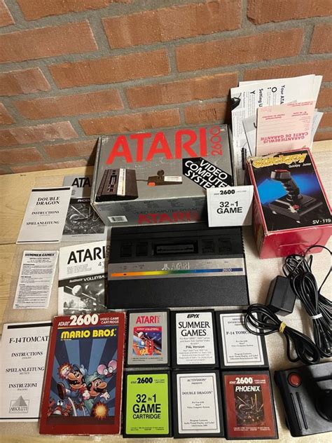 1 Atari 2600 Jr Console With Games 7 In Original Box Catawiki