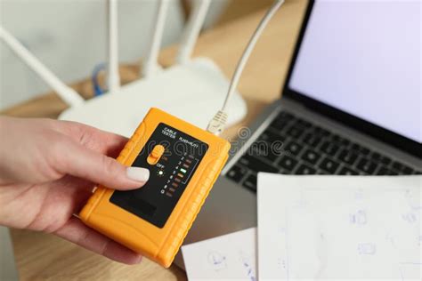 Hand Of Woman Holding LAN Speed Tester For Checking Network Stock Photo Image Of Internet