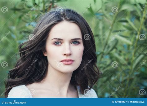 Elegant Woman Outdoor Pretty Brunette Girl Face On Green Spring