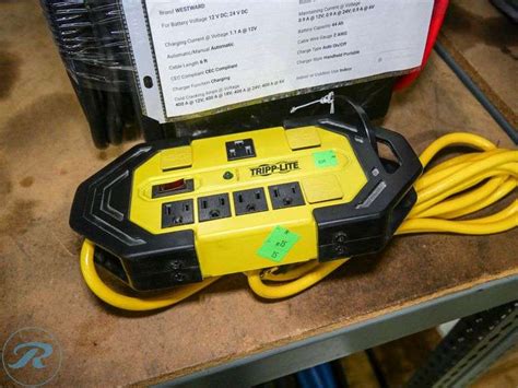 Westward Battery Jump Starter And Trip Lite Surge Bar Roller Auctions