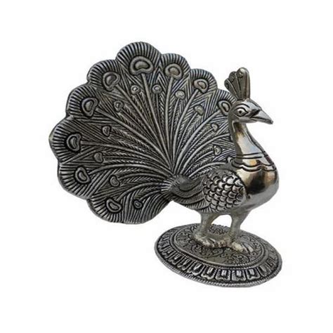 White Metal Dancing Peacock Statue At Best Price In Greater Noida By