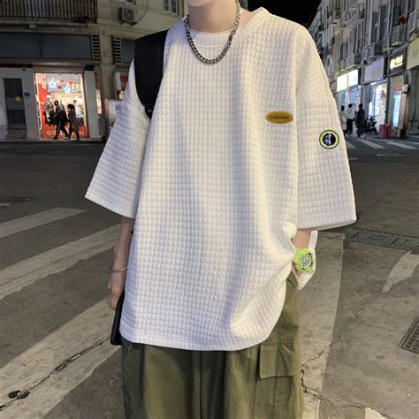 เสื้อยืดแขนสั้น พิมพ์ลายวาฟเฟิล ทรงหลวม เข้ากับทุกการแต่งกาย แฟชั่นฤดู
