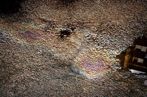Oil After Rain Makes Spots With Rainbow Reflections Refractive Sun Spectrum Stock Image Image