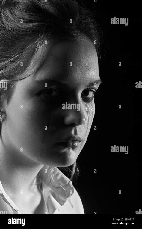 Sad Woman Crying Looking At Camera On Black Background Closeup Portrait Monochrome Stock