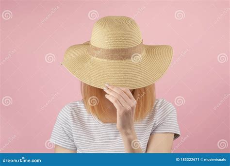 Girl Hiding Her Face With A Straw Hat Stock Image Image Of Portrait