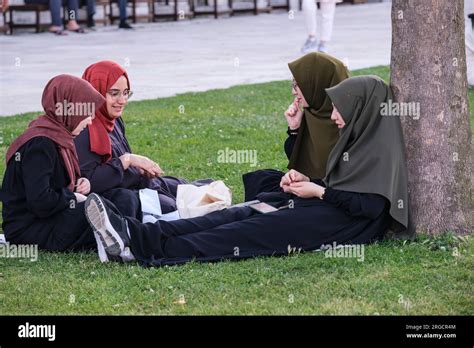 Istanbul Turkey Turkiye Turkish Muslim Girls Relaxing On The Lawn Of