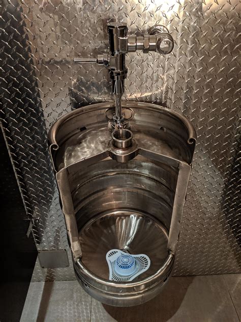 The Urinals In My Local Kelseys Restaurant Are Repurposed Beer Kegs