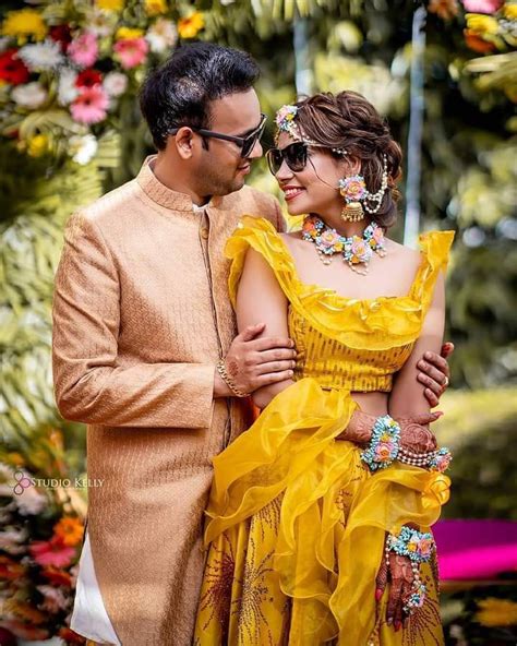 Pin By Harshit Shivhare On Haldi Poses Couple Haldi Ceremony Outfit