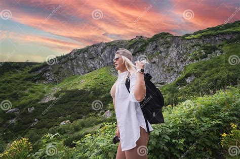 Athletic Beautiful Girl In Sunglasses Hiking In The Tatra Mountains At