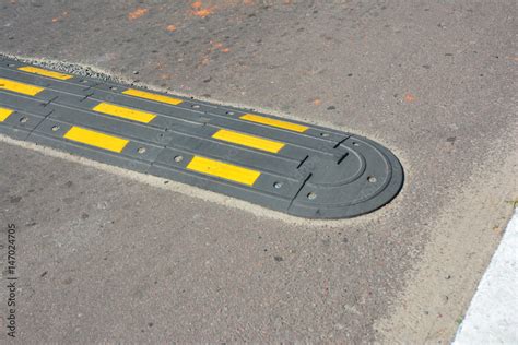 Traffic Safety Speed Bump With Crosswalk On An Asphalt Road Speed