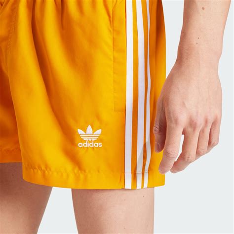 Clothing Adicolor 3 Stripes Swim Shorts Orange Adidas Qatar