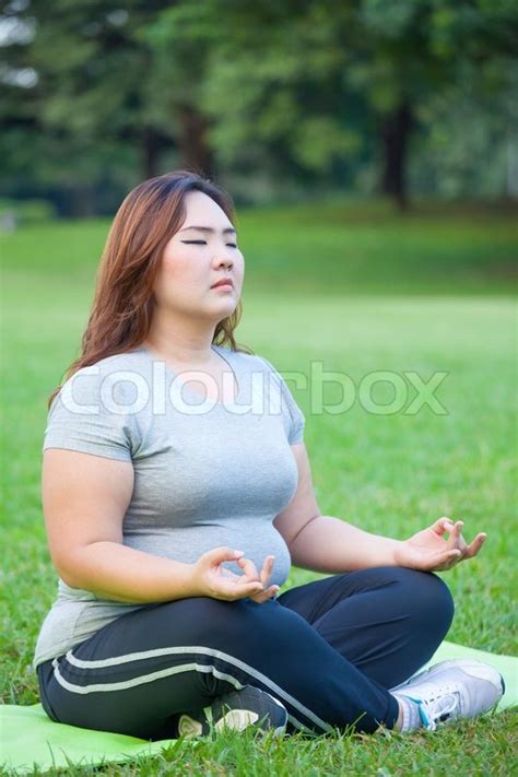 Plus Size Asian Woman Practicing Yoga Stock Image Colourbox