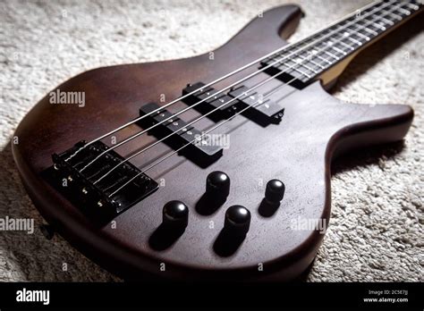 Bass Guitar With Four Strings Popular Rock Musical Instrument Close