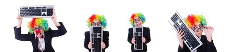 The Funny Clown With Keyboard On White Funny Clown With Keyboard On